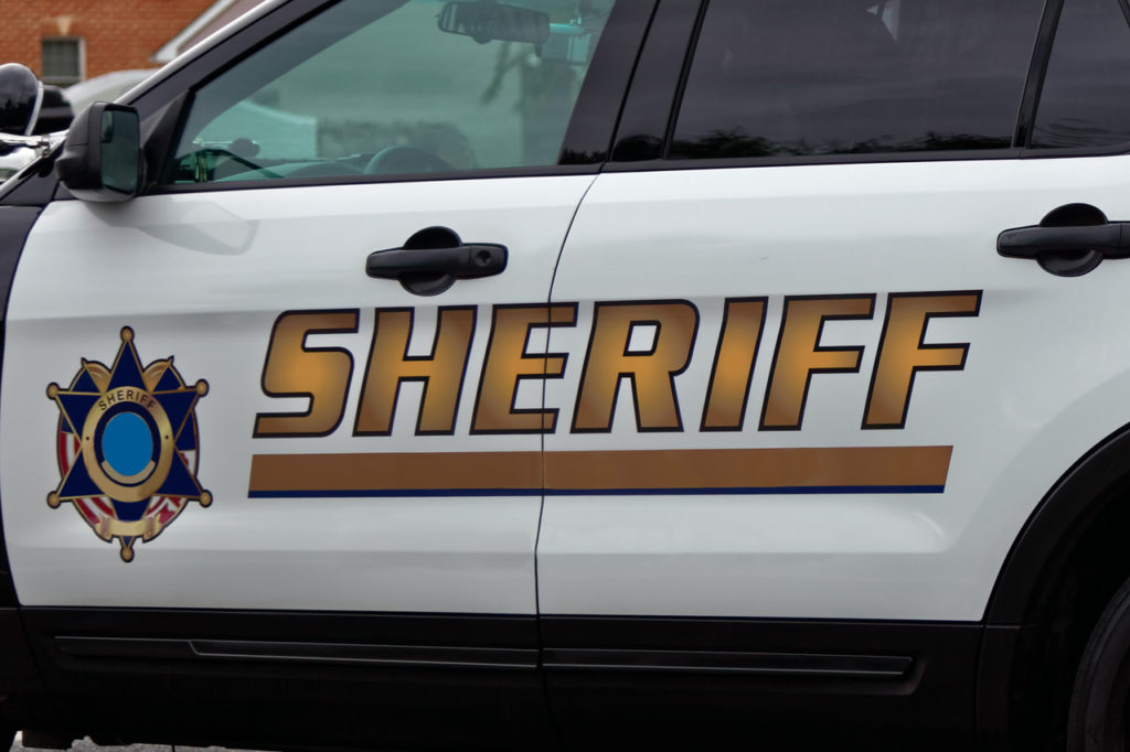 Side View Sheriff’s Car | Corbett & Corbett LLP